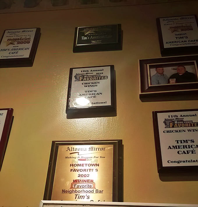 Wall of fame! These awards aren't just decoration &ndash; they're the community's way of saying "these wings and neighborhood vibes are officially spectacular."