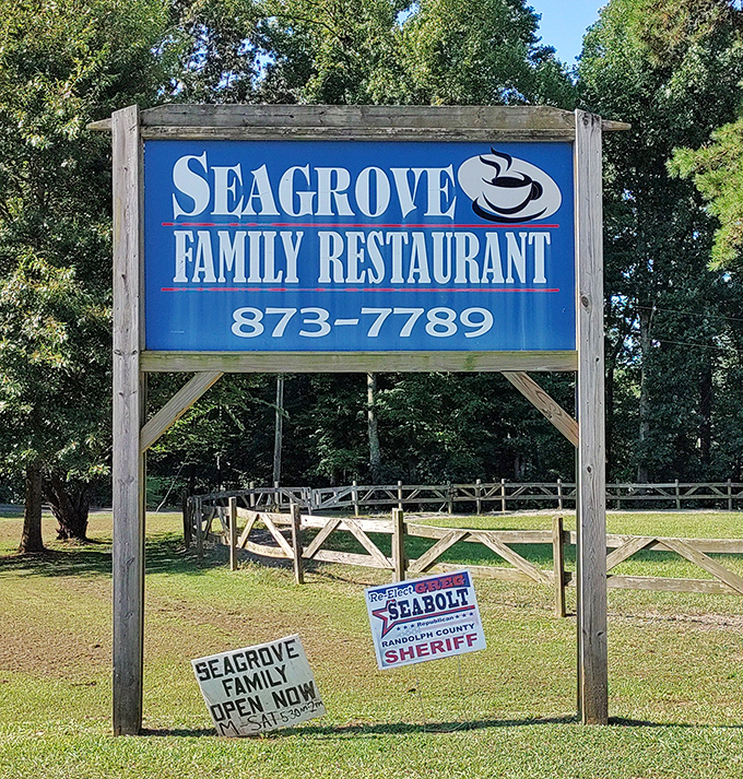 This roadside sign has likely guided hungry travelers for decades, standing as a landmark that says, "Yes, we're still here, and yes, the food's still good."