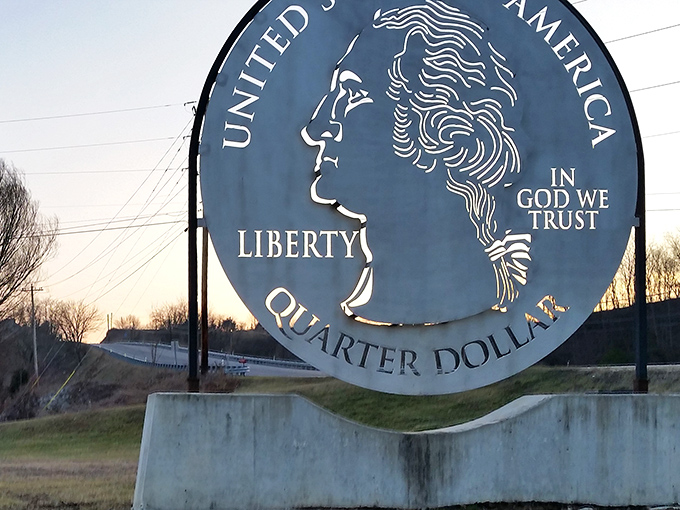 Twilight brings a golden glow to this metallic marvel. The quarter silhouetted against the fading light creates a quintessential road trip memory.