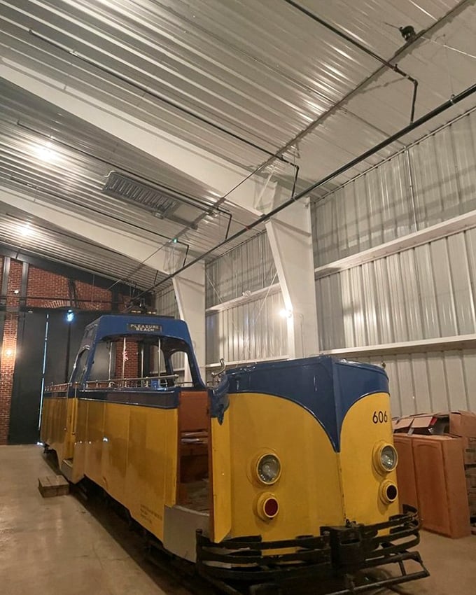 The museum's collection includes this striking blue and yellow trolley, its distinctive front end designed to navigate crowded urban streets with style.