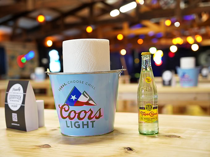 Every great barbecue deserves a proper beverage companion. In Texas, that often means an ice-cold Topo Chico or a longneck.