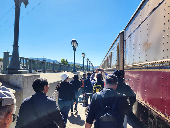 Fellow travelers eagerly board their wine chariot, proving that the only thing better than a train is one that serves world-class vintages.