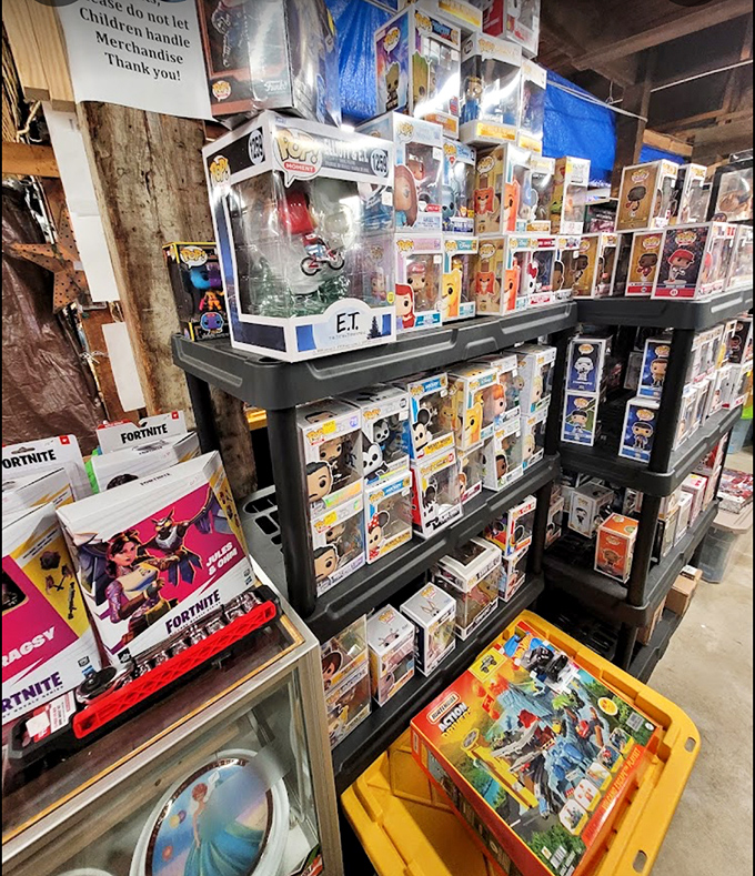 Pop culture figurines standing at attention, from E.T. to Fortnite characters. These plastic celebrities are ready for their close-up on your bookshelf. 