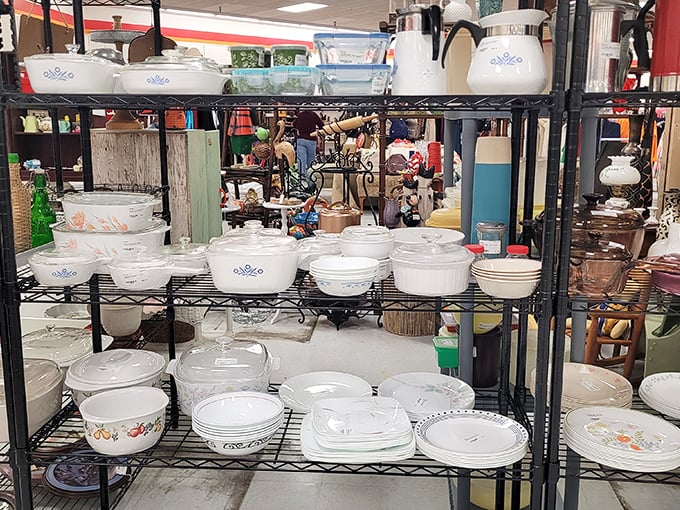 Corningware paradise! Your grandmother would elbow you aside to get to this display of pristine vintage kitchenware.