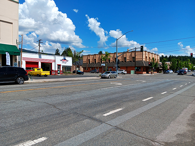 Summer brings brilliant blue skies and perfect mountain visibility. Downtown buildings seem to bow respectfully toward their towering neighbor.
