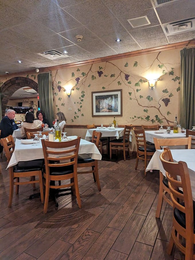 Those painted grape vines climbing the walls aren't just decoration&mdash;they're a visual promise of the wine-friendly feast that awaits you.