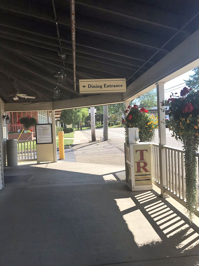 The entrance beckons with the promise of comfort food nirvana. Those hanging flower baskets aren't decoration&mdash;they're a colorful runway guiding you to deliciousness.