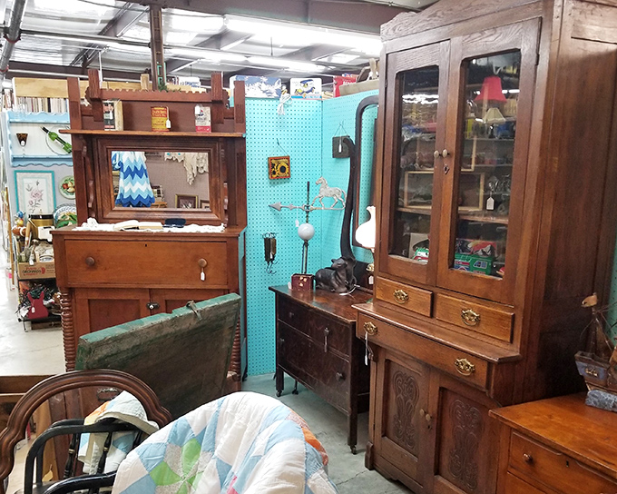 Sturdy wooden cabinets with beveled mirrors reflect a time when furniture was built to last generations. Your great-grandfather might have shaved in front of one just like this.