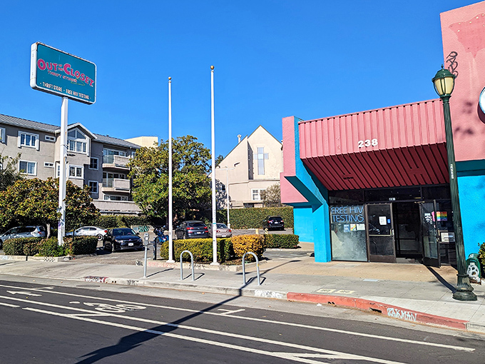 The teal and pink facade of Out of the Closet brightens the street. Shopping that supports healthcare never looked so inviting.