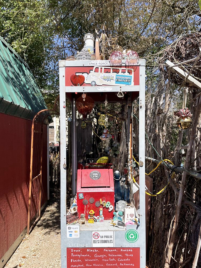 What was once a phone booth now serves as a tiny museum of trinkets&mdash;the perfect metaphor for communication in the pre-smartphone era.