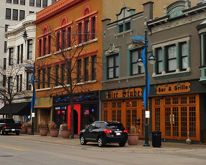 These pastel-hued buildings along 15th Street showcase Moline's architectural diversity, with ornate cornices and large windows hinting at their storied past.
