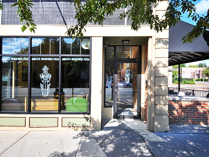 Amato's Woodfired Pizza's clean, minimalist exterior belies the flavor complexity waiting inside&mdash;like a culinary thriller with a surprising plot twist.