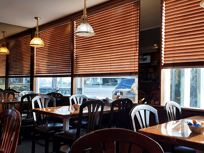Morning light filters through wooden blinds, turning an ordinary breakfast into a moment of unexpected beauty.