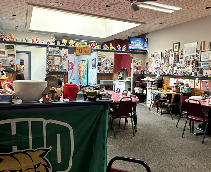 Every inch of wall space tells a story, while the Ohio banner reminds you that state pride and good food are always on the menu.