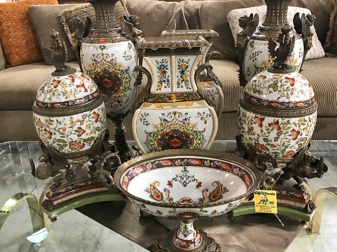 Ornate porcelain with gilded accents awaits the right collector. These pieces have probably survived several Florida hurricanes and still look ready for a royal table setting.
