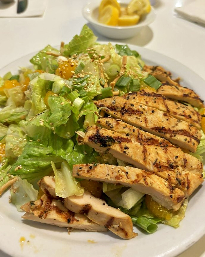 When salads get serious about protein&mdash;grilled chicken strips lounging on crisp lettuce like they own the nutritional real estate.