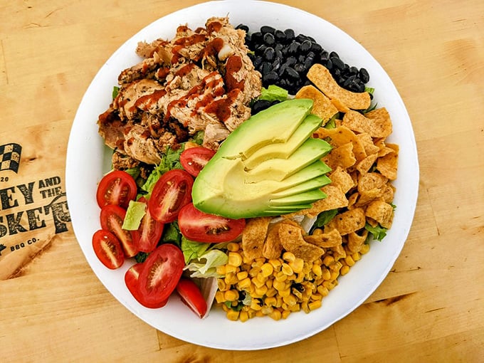 When your salad comes with enough barbecue chicken to make a vegetarian nervous. That sliced avocado is just showing off.