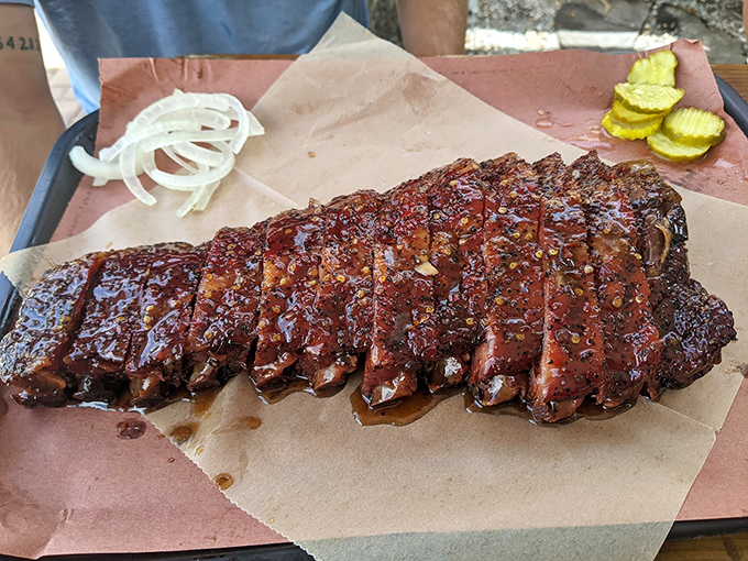 Ribs with a glaze so shiny you could check your reflection before diving in. That bark has more character than most movie protagonists.