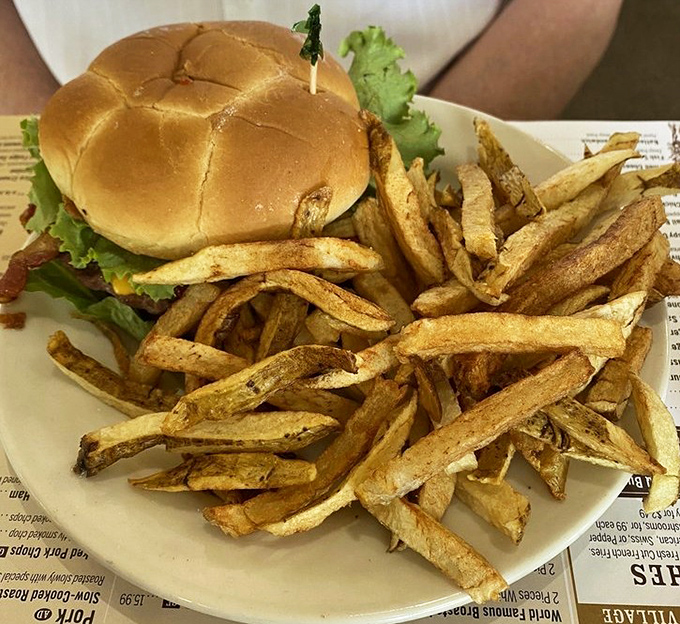 A burger and fries that remind you why classics became classics. Those hand-cut fries aren't just potatoes—they're crispy vehicles for happiness.