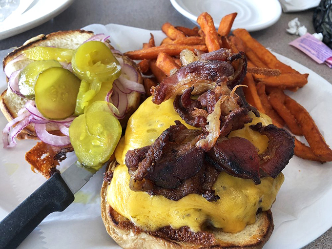 A burger that doesn't need a fancy name, just your full attention. Those sweet potato fries aren't a side dish&mdash;they're co-stars in this lunch production.