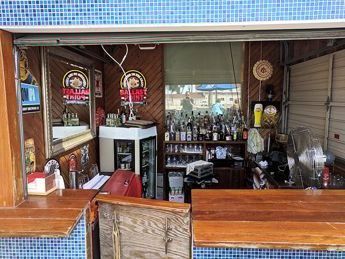 A bar stocked for serious maritime enjoyment. Those stained glass Bartlett's signs suggest you're in a place that takes both drinking and tradition seriously.