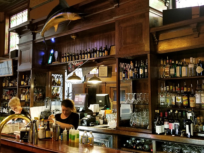 Bottles lined up like soldiers ready for duty. This isn't just a bar &ndash; it's a liquid library of possibilities.