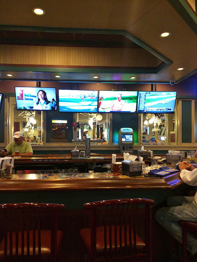 Cozy corner tables offer the perfect vantage point for people-watching while debating the merits of one more slice.