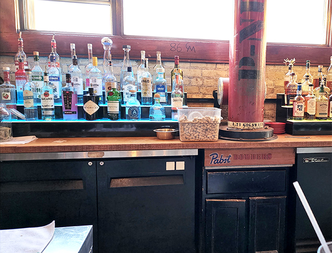 The bar showcases an impressive lineup of spirits, though after one of those burgers, you might need a nap more than a nightcap.