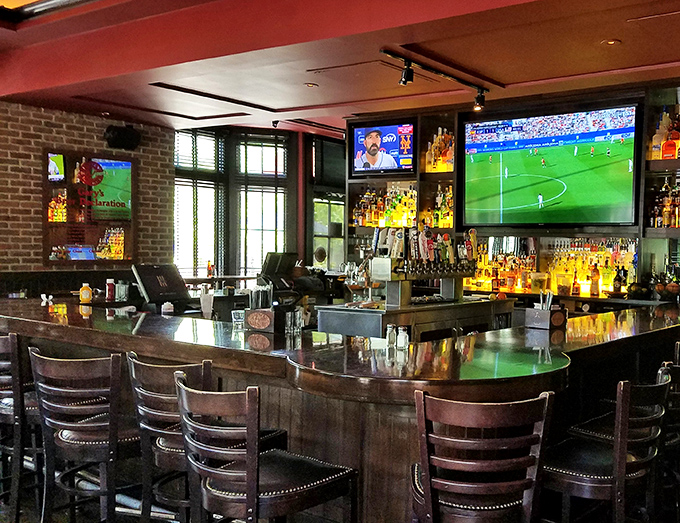 Bar seating that offers front-row views of both the game and the impressive lineup of spirits &ndash; multitasking at its most delicious.