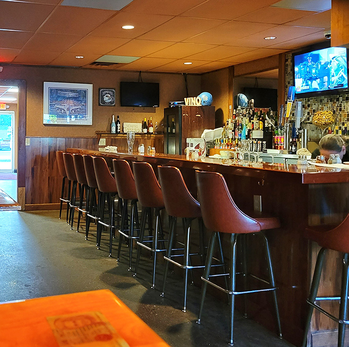 Bar seating: where solo diners become temporary family and the bartender knows all the town gossip worth hearing.