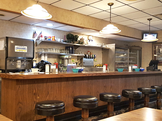 Those swivel stools have witnessed countless coffee refills, friendly gossip, and the kind of conversations that solve the world's problems.
