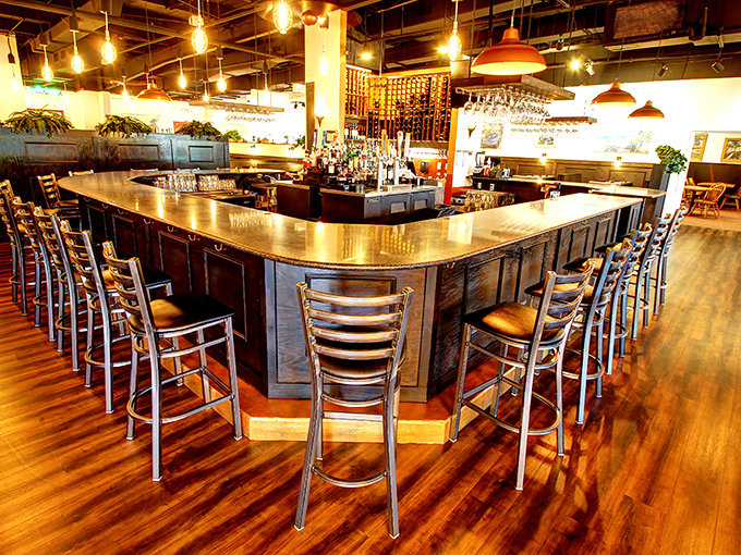 This horseshoe bar invites you to saddle up and stay awhile. The polished wood has heard more Naples stories than any local historian.