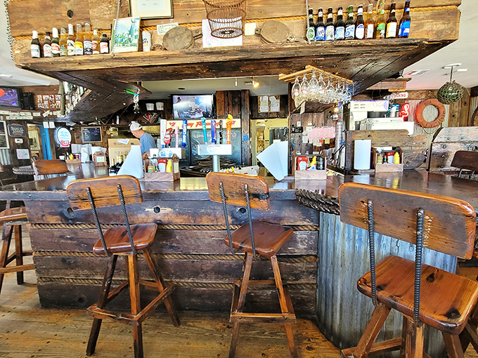 The weathered wood bar looks like it could tell stories of countless fishing tales&mdash;some of which might actually be true.