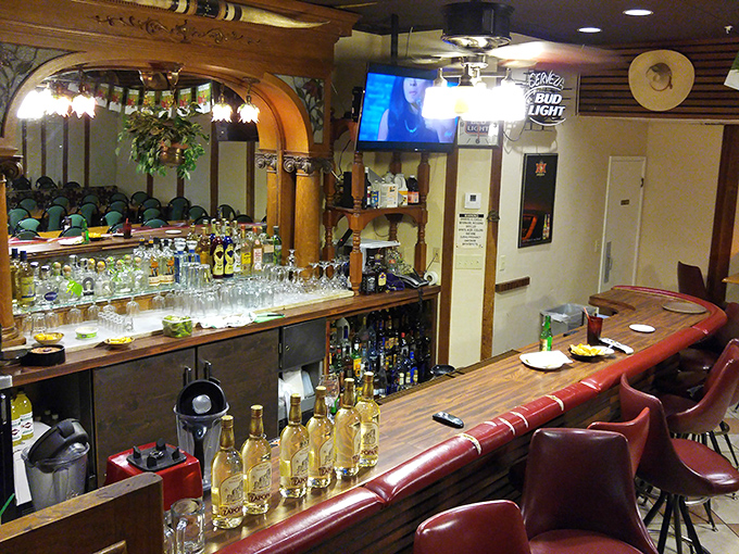 The full bar beckons with premium spirits and that impressive tequila selection, perfect for washing down spicy green chili adventures.