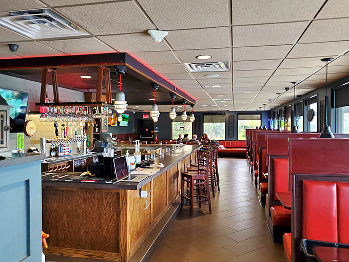 The bar area offers a cozy spot where solo diners feel welcomed and couples can enjoy intimate conversations.