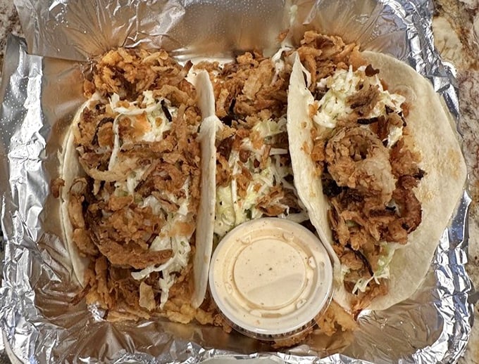 These fish tacos aren't just a meal&mdash;they're a vacation for your taste buds, with crispy fish, fresh slaw, and a sauce that ties it all together.