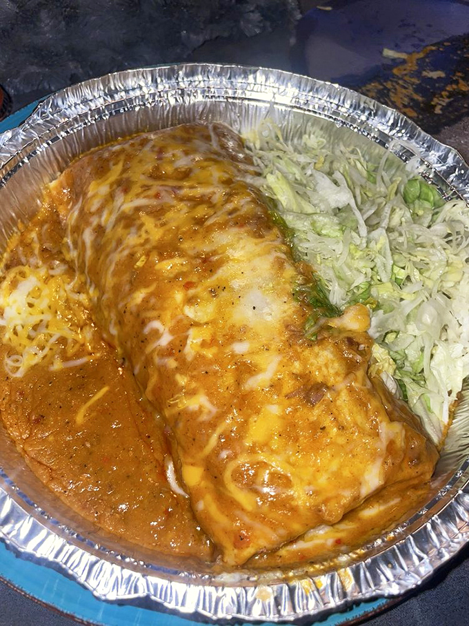 This beef burrito wrapped in foil like a precious gift, because that's exactly what it is. 
