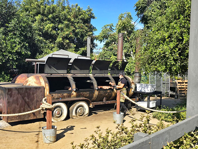 Behind every great barbecue joint is a person tending fires with the dedication of an Olympic torch bearer.