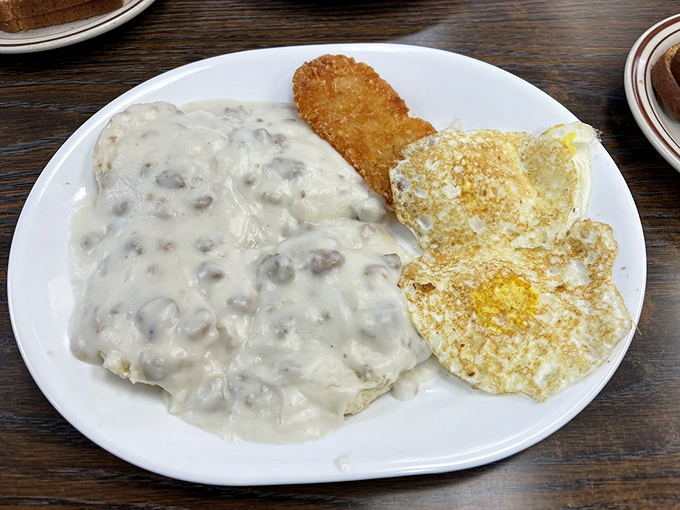 Biscuits and gravy: the breakfast that asks, "What plans did you have today? Because you'll need a nap instead." That golden-yolked egg is just showing off.