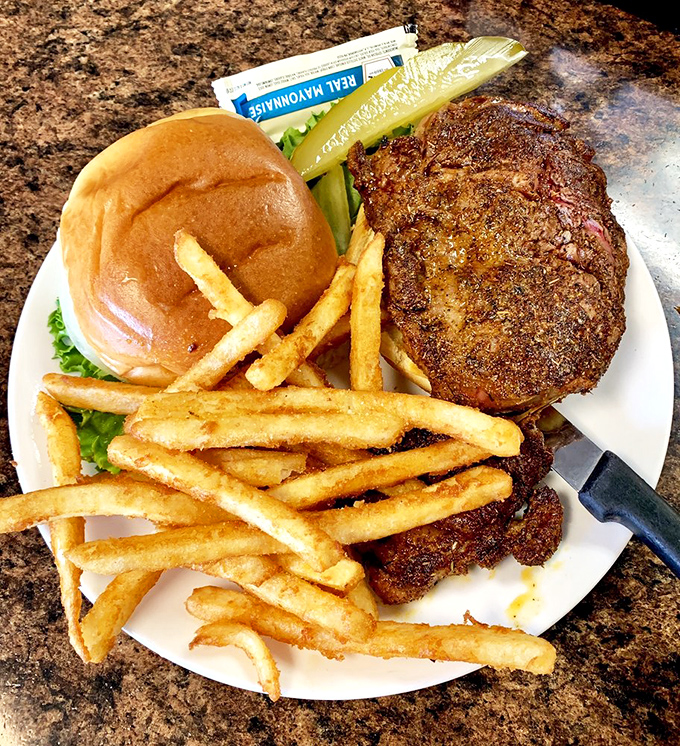 The burger and fries combo that reminds you why classics never go out of style&mdash;a perfectly seasoned patty that doesn't need fancy aioli to impress.