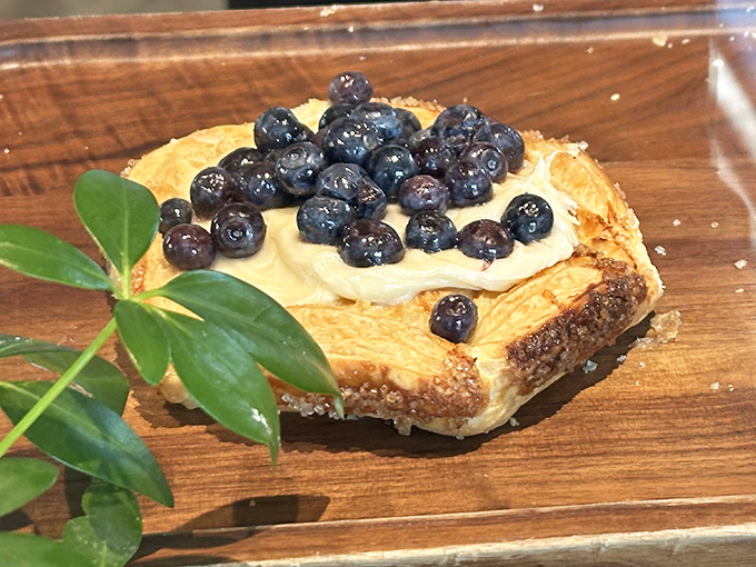 This blueberry-topped pastry isn't just breakfast&mdash;it's edible poetry. Those berries are like little blue jewels crowning a buttery throne.