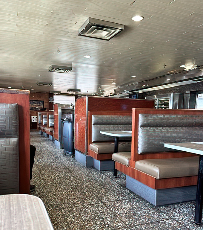 Booths designed for comfort and conversation, where "let's grab a quick bite" turns into three hours of solving the world's problems.