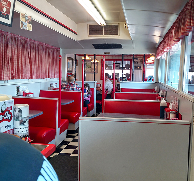 These booths have cradled more family celebrations, first dates, and morning-after regrets than any therapist's couch in town.