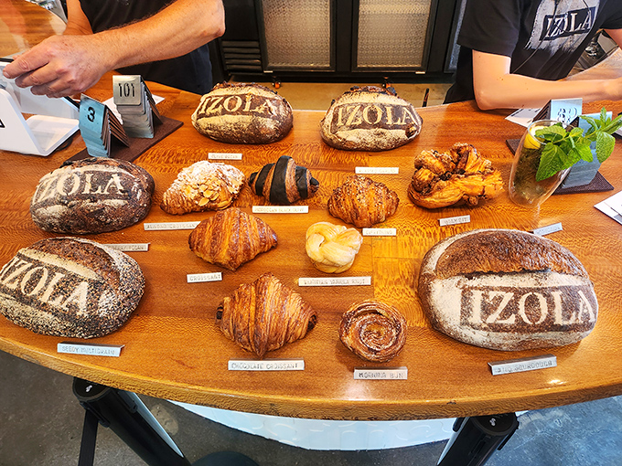 A wooden platter showcasing IZOLA's greatest hits. Like a bread-based family portrait where everyone is equally photogenic.