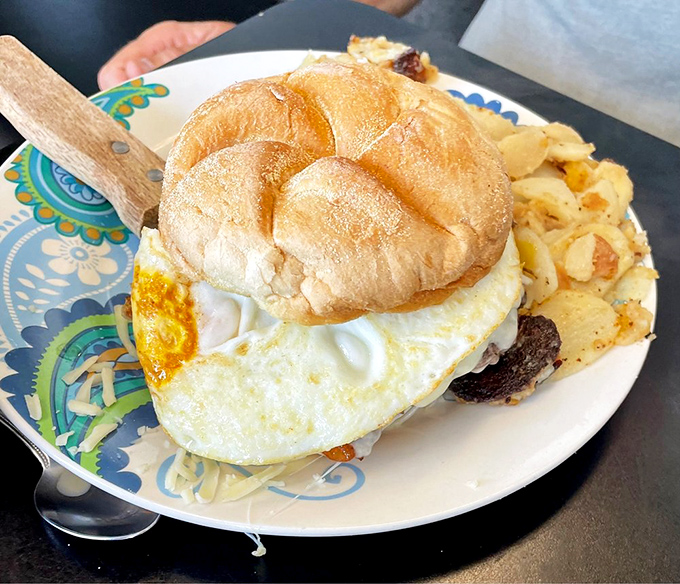Behold the breakfast sandwich in its final form&mdash;a perfect egg crowning a throne of deliciousness, with home fries as loyal subjects.