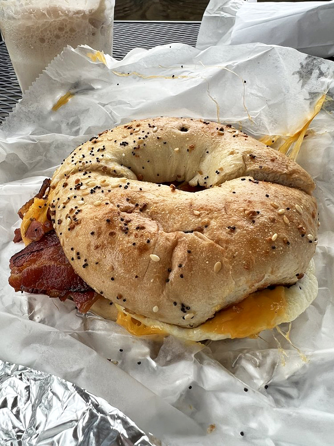 This isn't just a bagel sandwich—it's breakfast engineering at its finest. The structural integrity alone deserves an award.