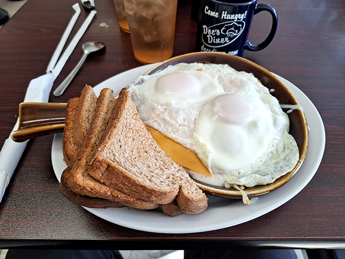 This breakfast skillet arrives loaded with eggs, hash browns, and sausage, proving that sometimes more is absolutely more.