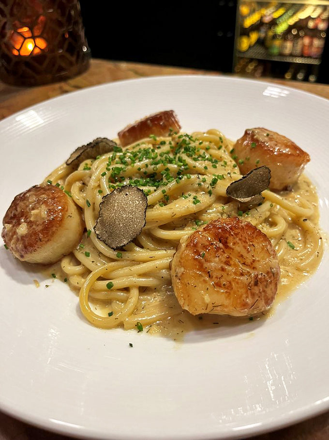 Scallops and pasta dancing in perfect harmony, with shaved truffle playing matchmaker. A dish that makes you want to applaud between bites.