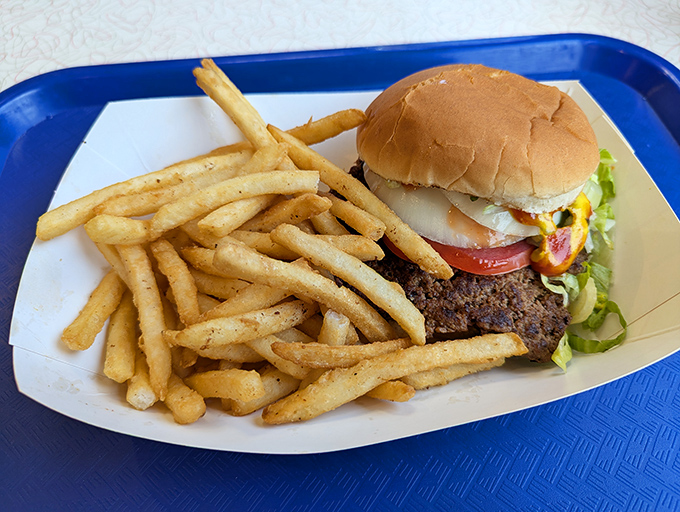 The platonic ideal of an American lunch&mdash;a burger that requires both hands and napkins, with fries so perfect they deserve their own fan club.