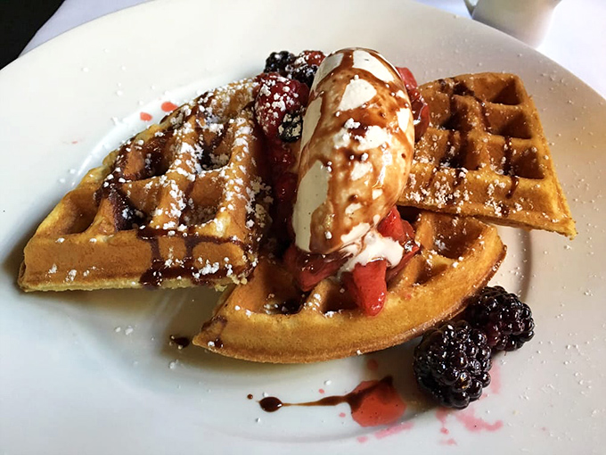 Buttermilk waffles topped with berries prove that breakfast dreams can come true any time. 